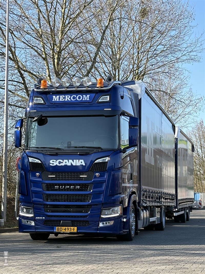 Mercom gaat lager met Scania
